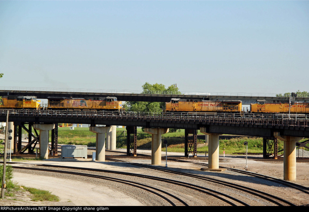 UP 7205 Meet's UP 5818 on the bridge at Santa Fe Junction.